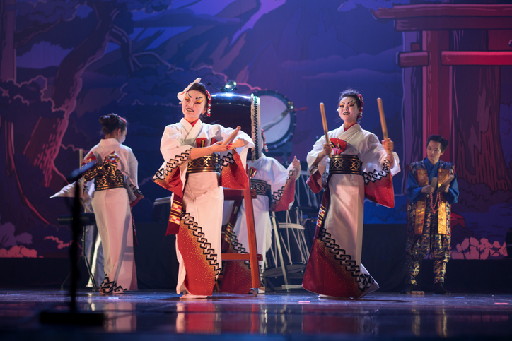 Traditional Japanese performance. Group of actresses in traditional ...